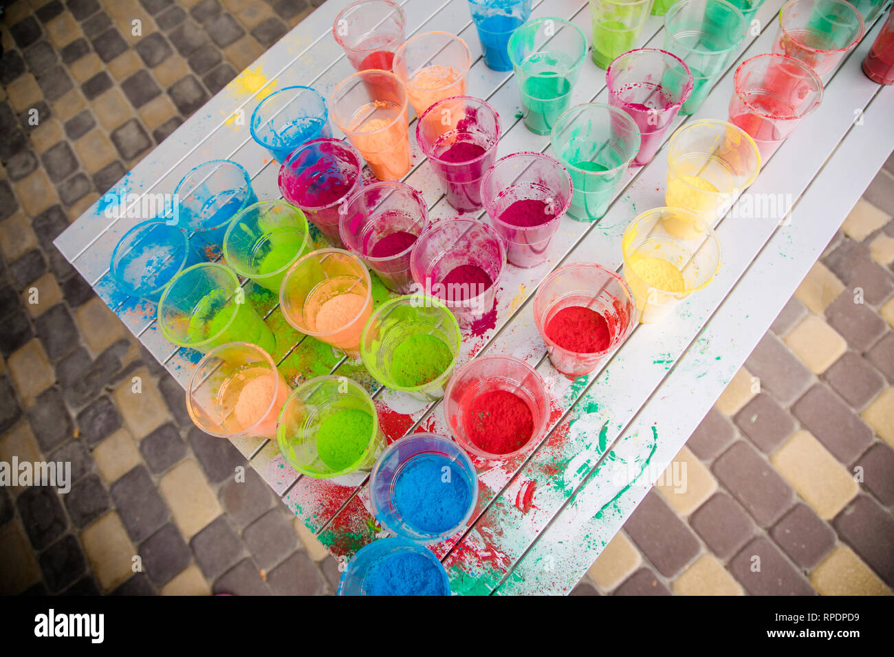 Cups with paint for the Indian Holi festival colours Stock Photo - Alamy