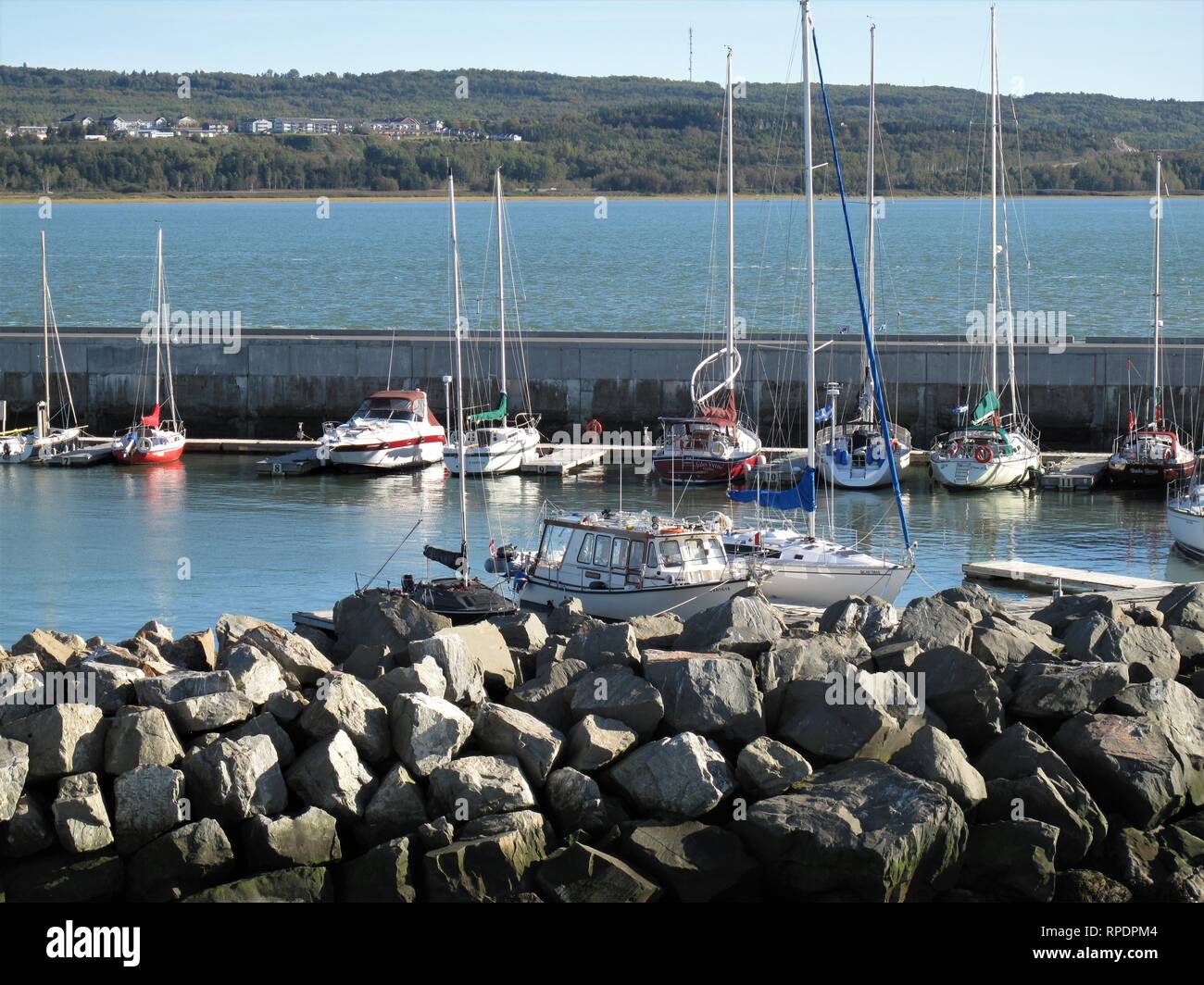 Yachts and sailing boats protected in a harbour Stock Photo - Alamy