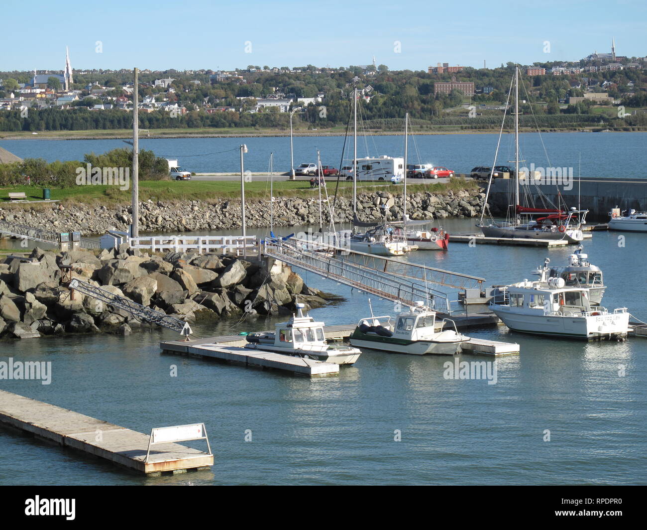 Yachts and sailing boats protected in a harbour Stock Photo - Alamy