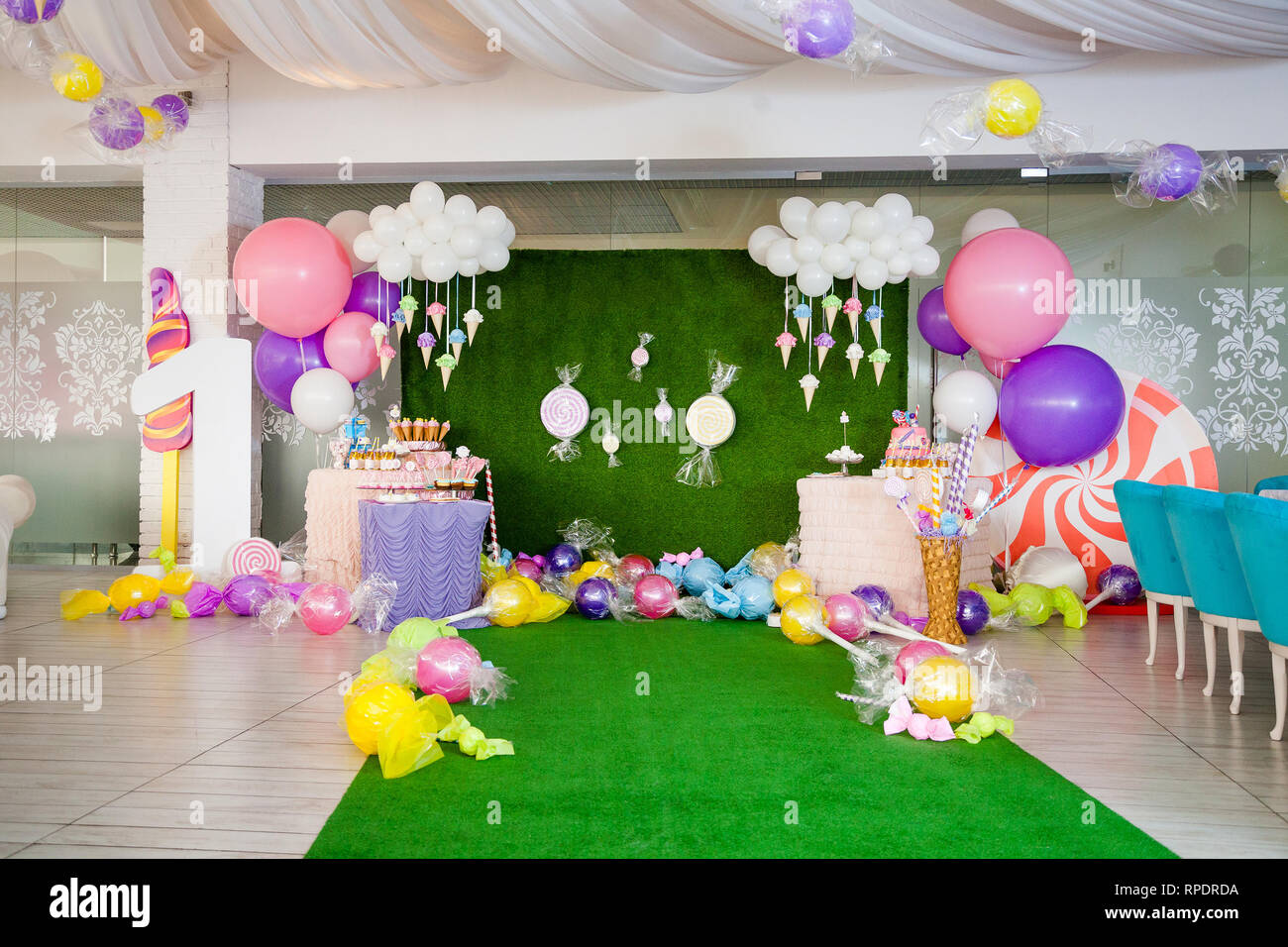 Birthday party concept, decorations for sweet party. Huge number one ...