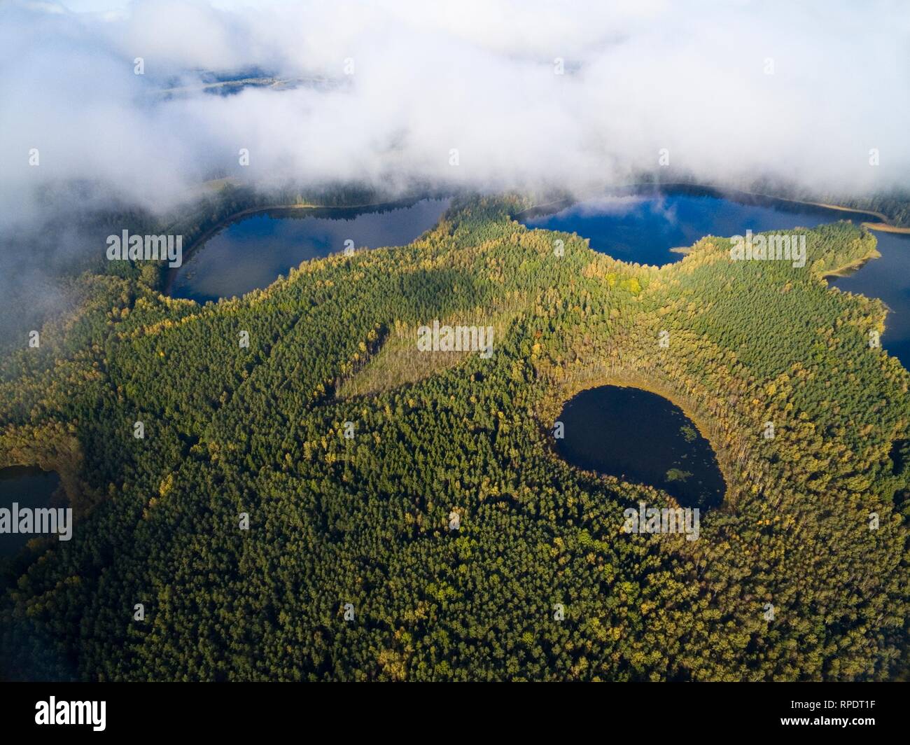Low level clouds over beautiful landscape of Mazury region during ...