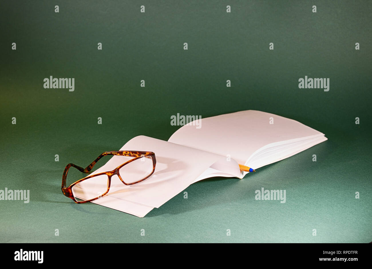 Book lying on the table hi-res stock photography and images - Alamy