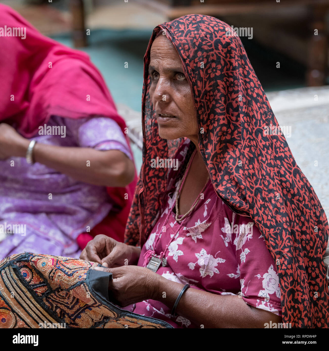 Indian women sewing textile hi-res stock photography and images - Alamy