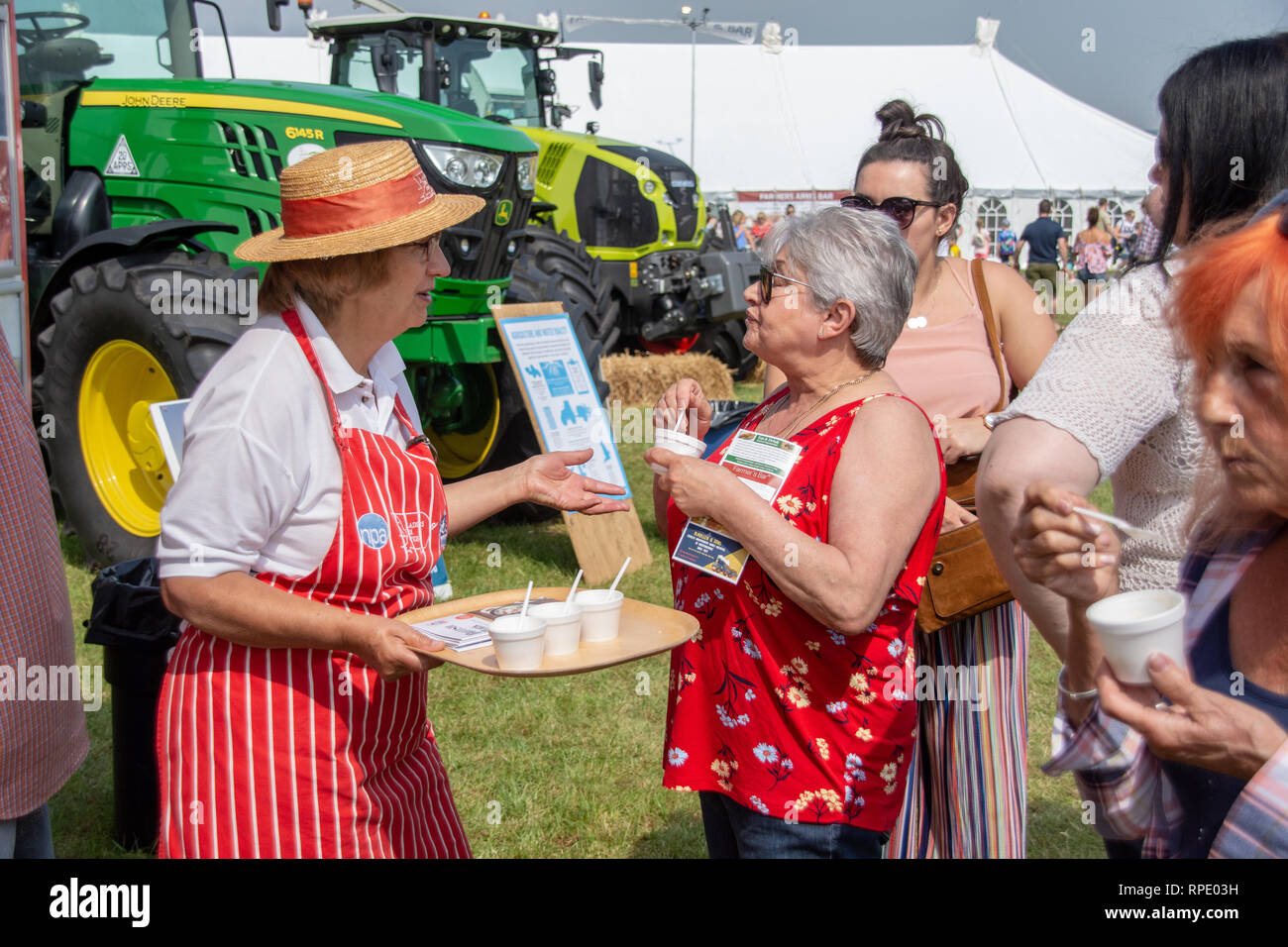 Woman with food sample hi-res stock photography and images - Alamy