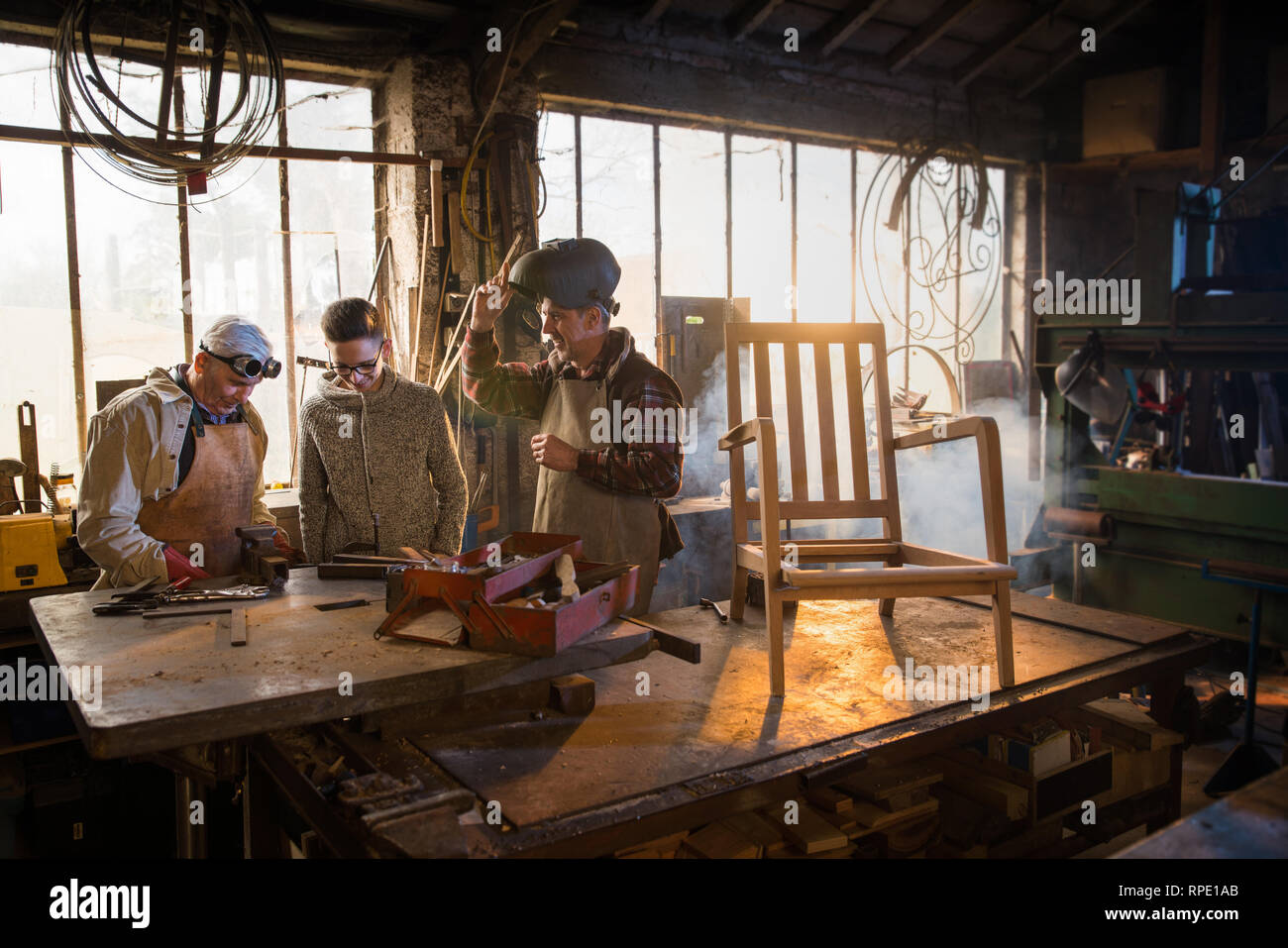 Two craftsmen at work bench hi-res stock photography and images - Alamy
