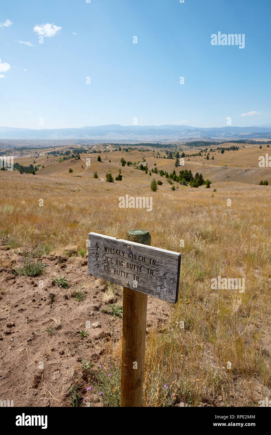 Trail direction sign overlooking Whiskey Gulch in Butte, Montana Stock ...