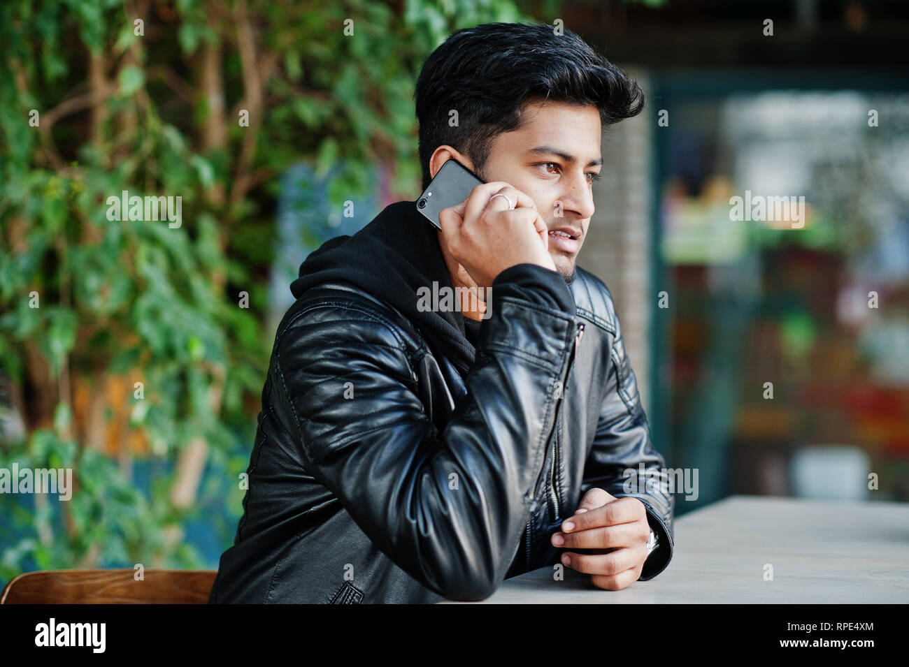Portrait of stylish and casual young asian man wear on leather jacket ...