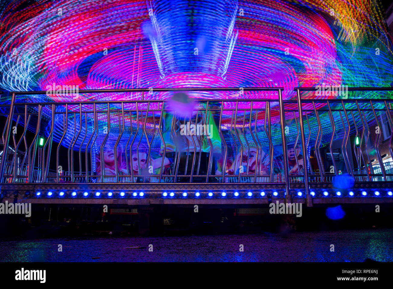 Funfair / fairground ride spinning lights Stock Photo - Alamy