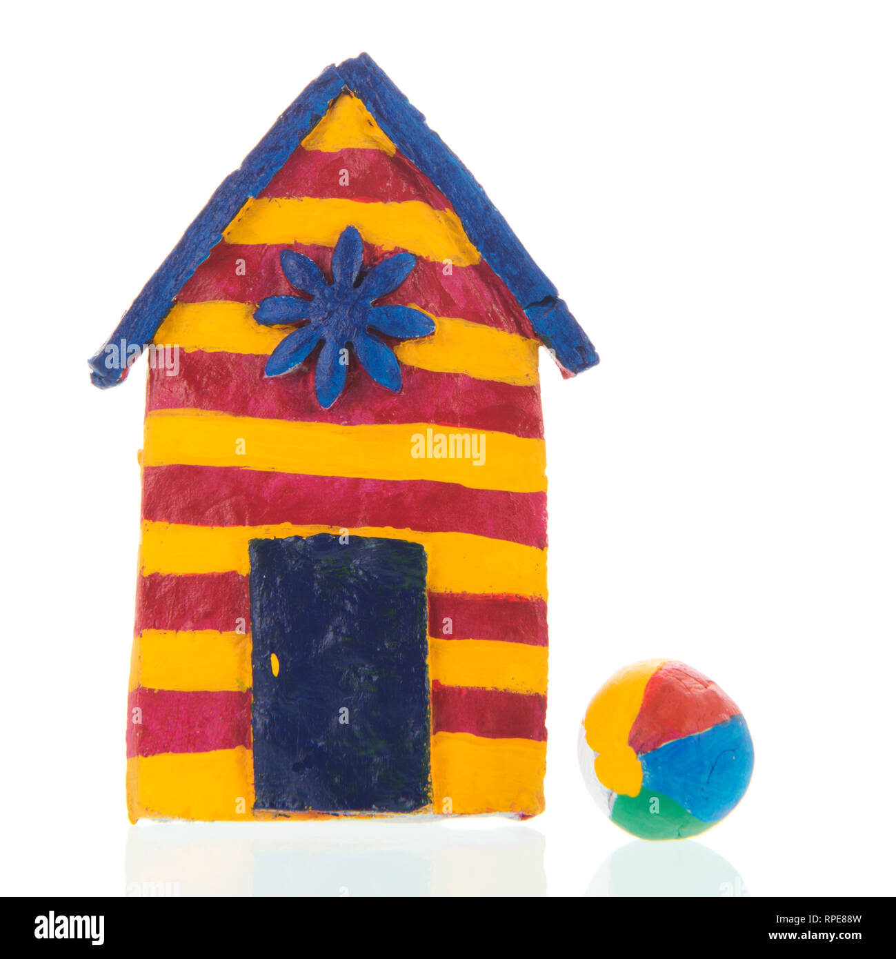 Colorful handmade beach cabin from clay isolated over white background ...