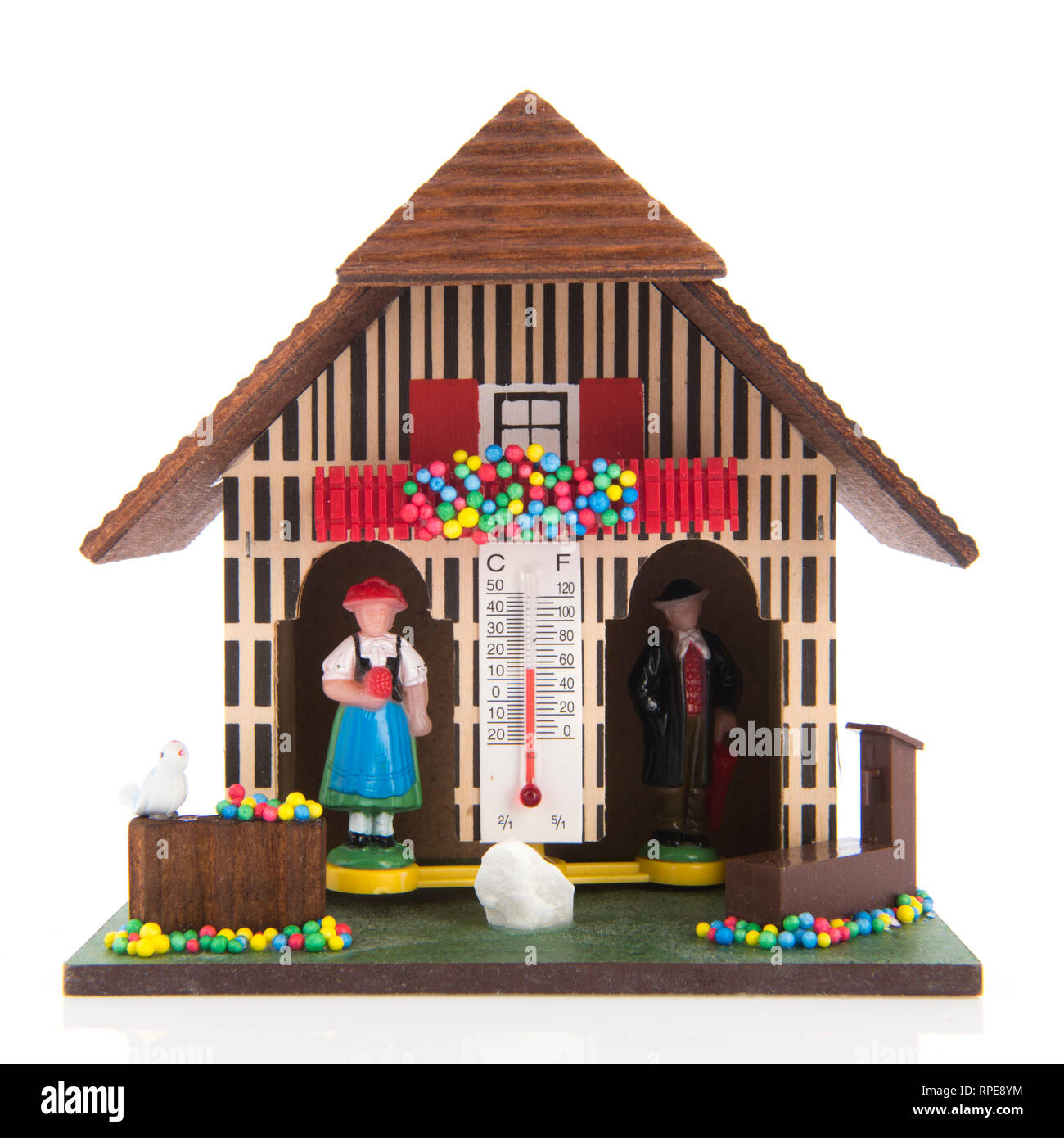 Miniature weather house with man and woman indoor and outdoor Stock ...