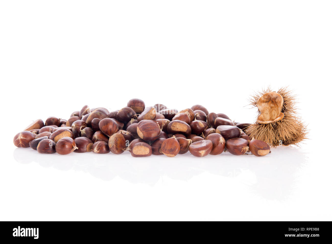 Sweet chestnuts isolated over white background Stock Photo - Alamy