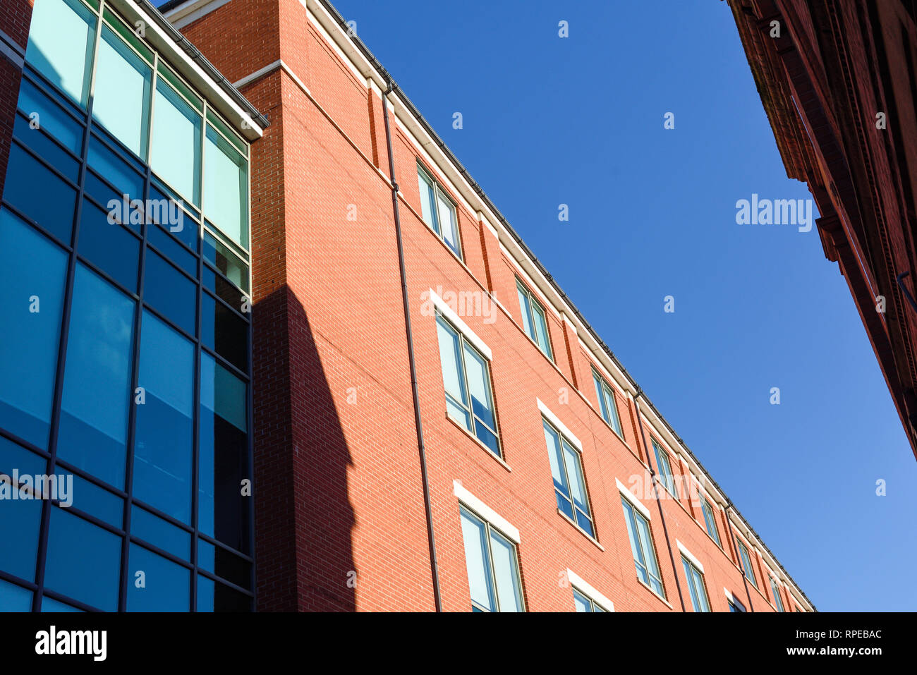Office Block street views Against a blue sky Stock Photo - Alamy