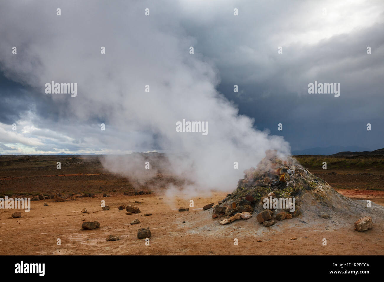 Hot steaming mud volcano or mud dome at Námafjall Hverir geothermal ...