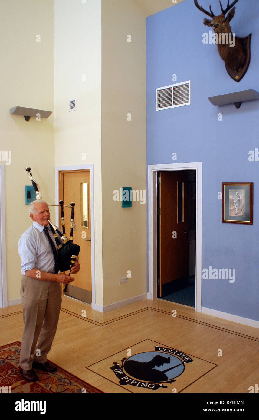 A man playing his bagpipe at The National Piping Centre. West End ...