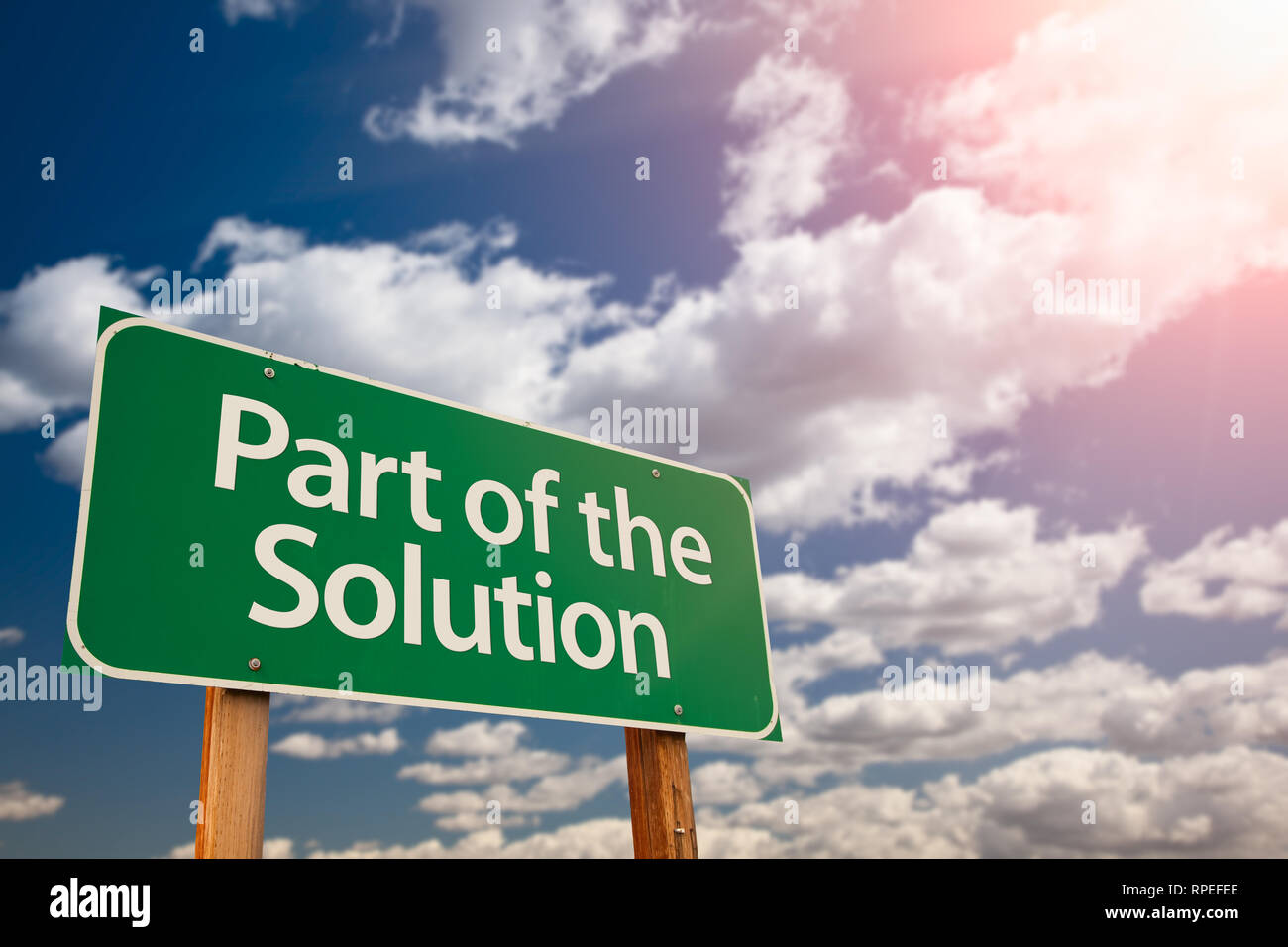 Part of the Solution Green Road Sign Aginst Sky Stock Photo - Alamy