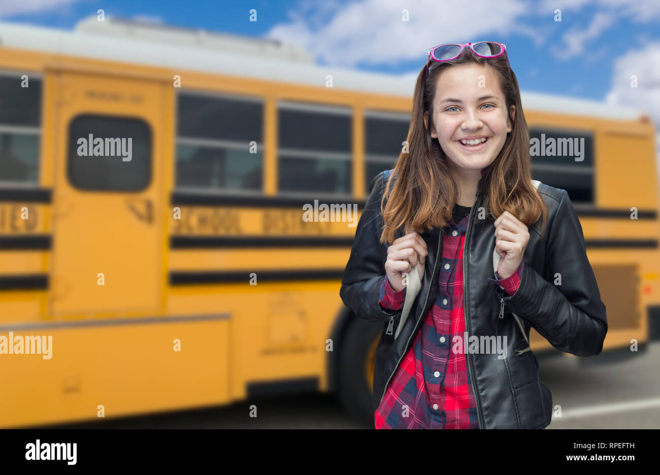Teens school bus hi-res stock photography and images - Alamy
