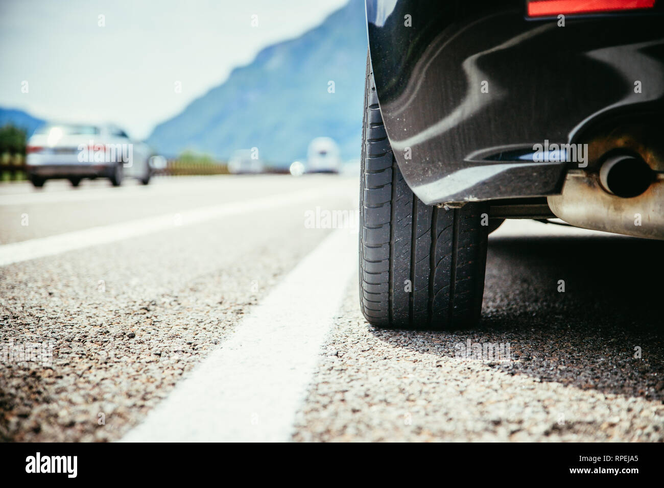 Car is standing on the breakdown lane, asphalt and tyre, Italy Stock ...