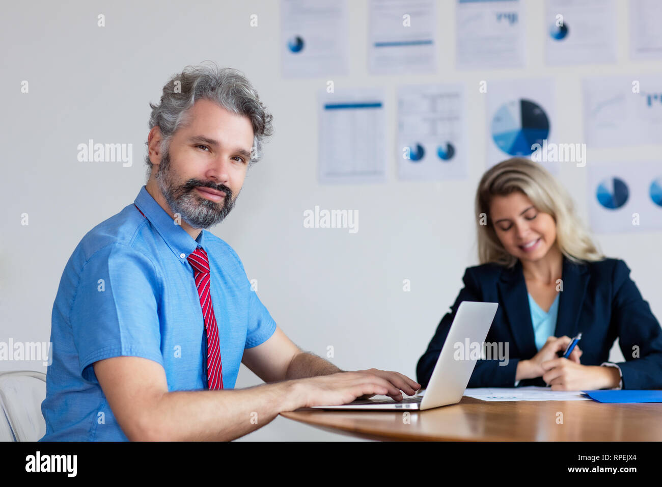 Older woman grey hair office hi-res stock photography and images - Alamy