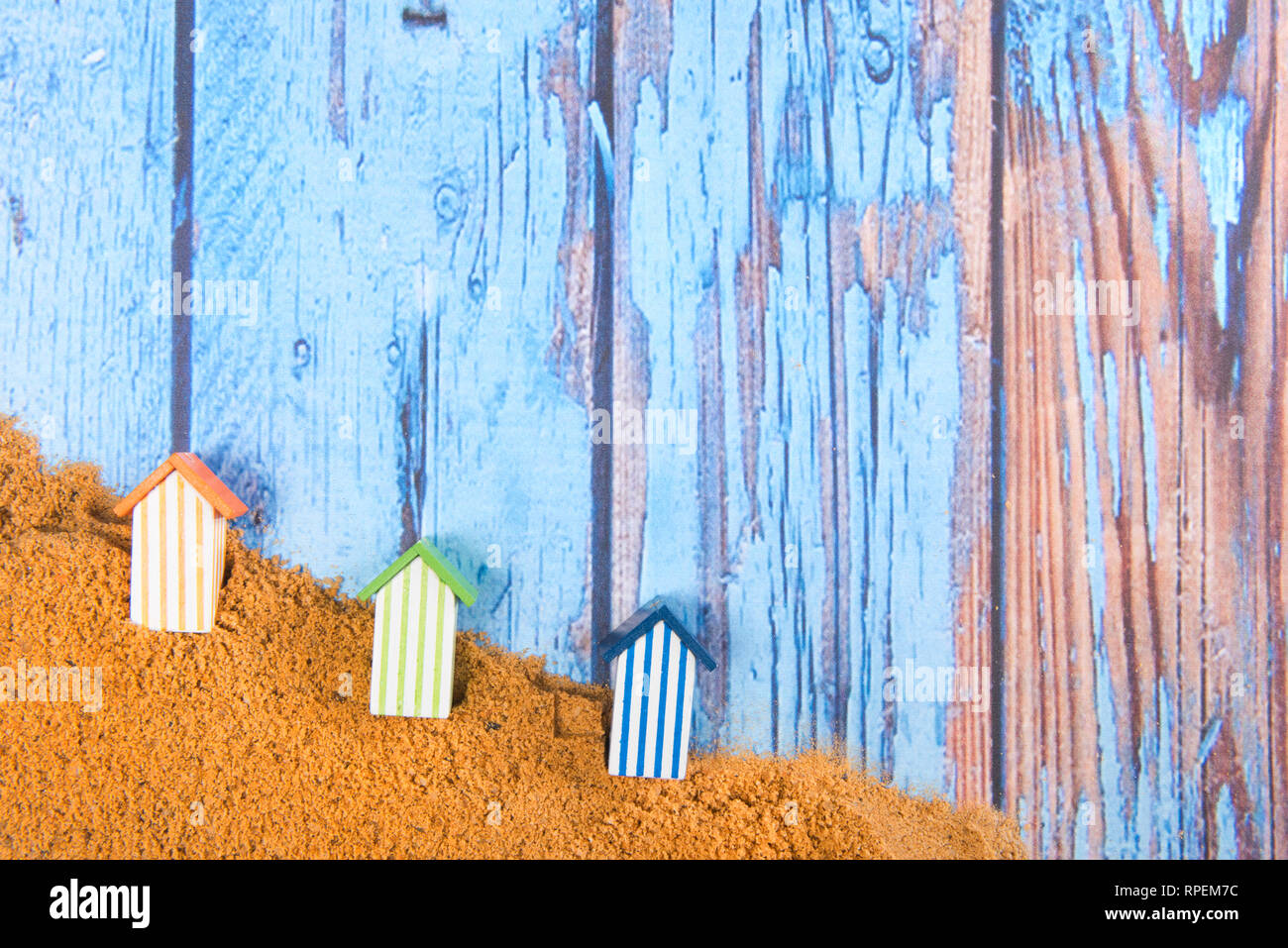 Beach huts in sand at the beach Stock Photo - Alamy