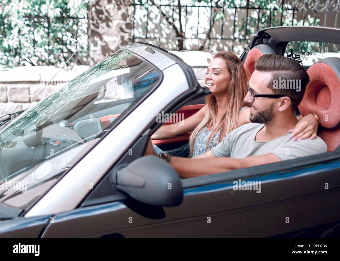 couple in love in a convertible car Stock Photo - Alamy