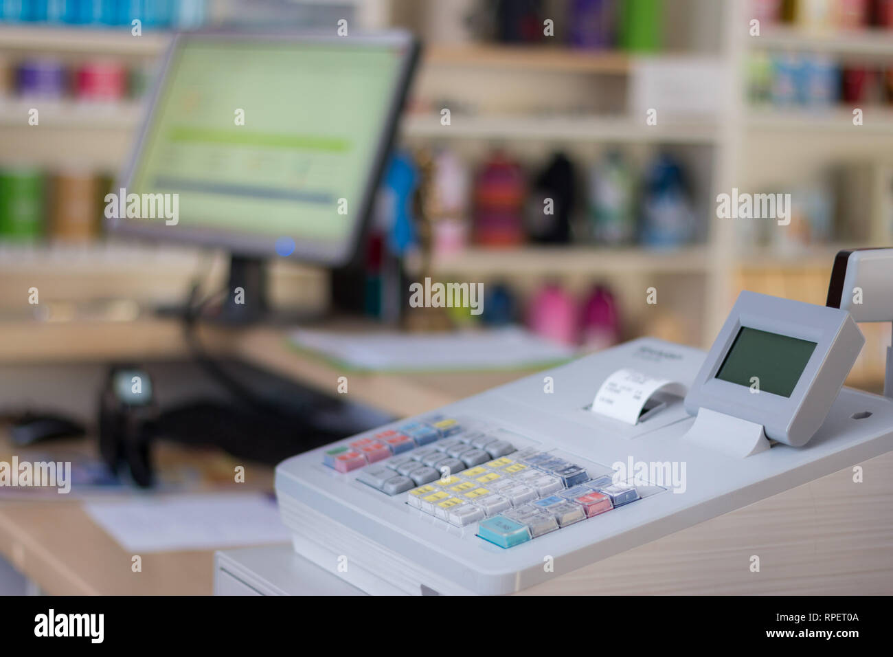 Cash register in a shop: Customer is paying purchase Stock Photo - Alamy