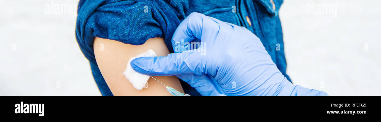 vaccination of children. An injection. Selective focus kids Stock Photo ...