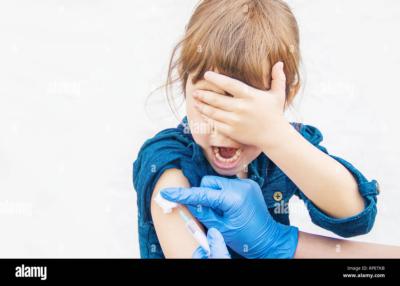 vaccination of children. An injection. Selective focus kids Stock Photo ...