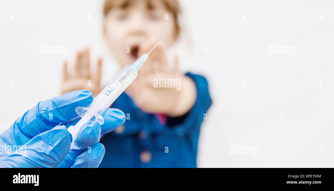 vaccination of children. An injection. Selective focus kids Stock Photo ...