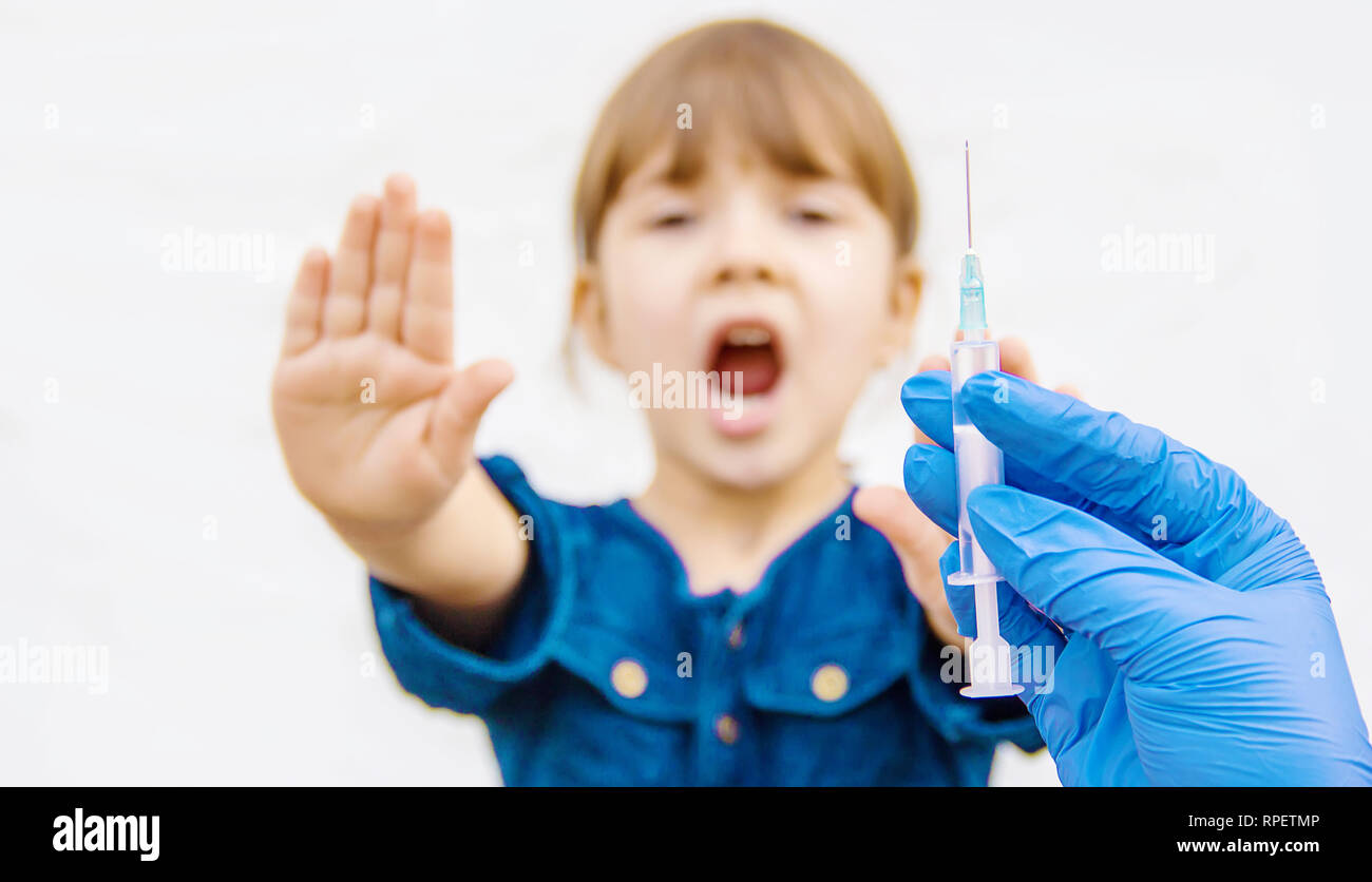 vaccination of children. An injection. Selective focus kids Stock Photo ...