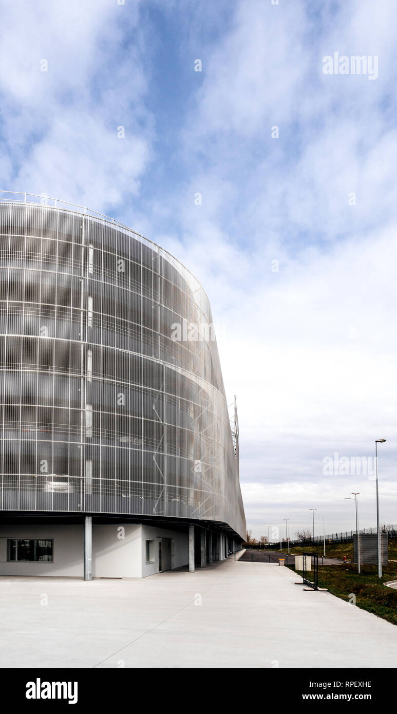 Modern parking building with large aerated facade Stock Photo - Alamy
