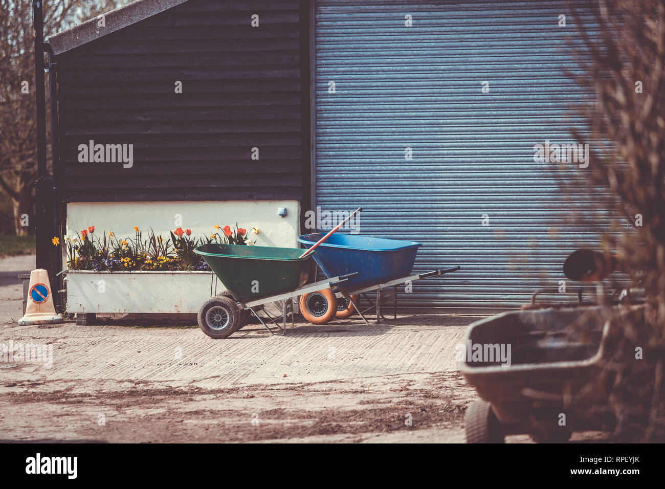 Empty wheelbarrows hi-res stock photography and images - Alamy