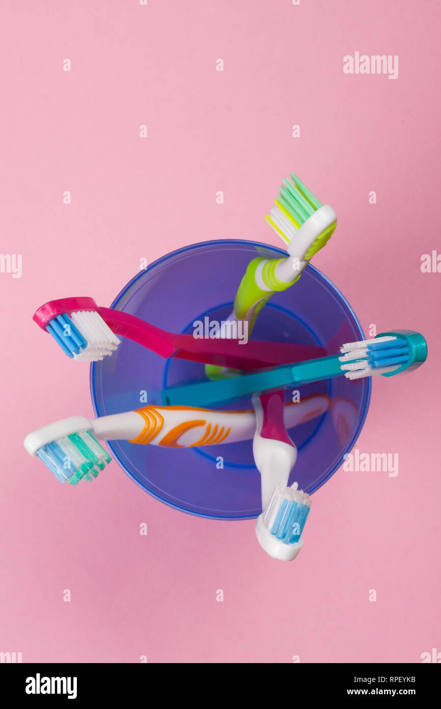 Toothbrush and toothpaste in cup hi-res stock photography and images ...