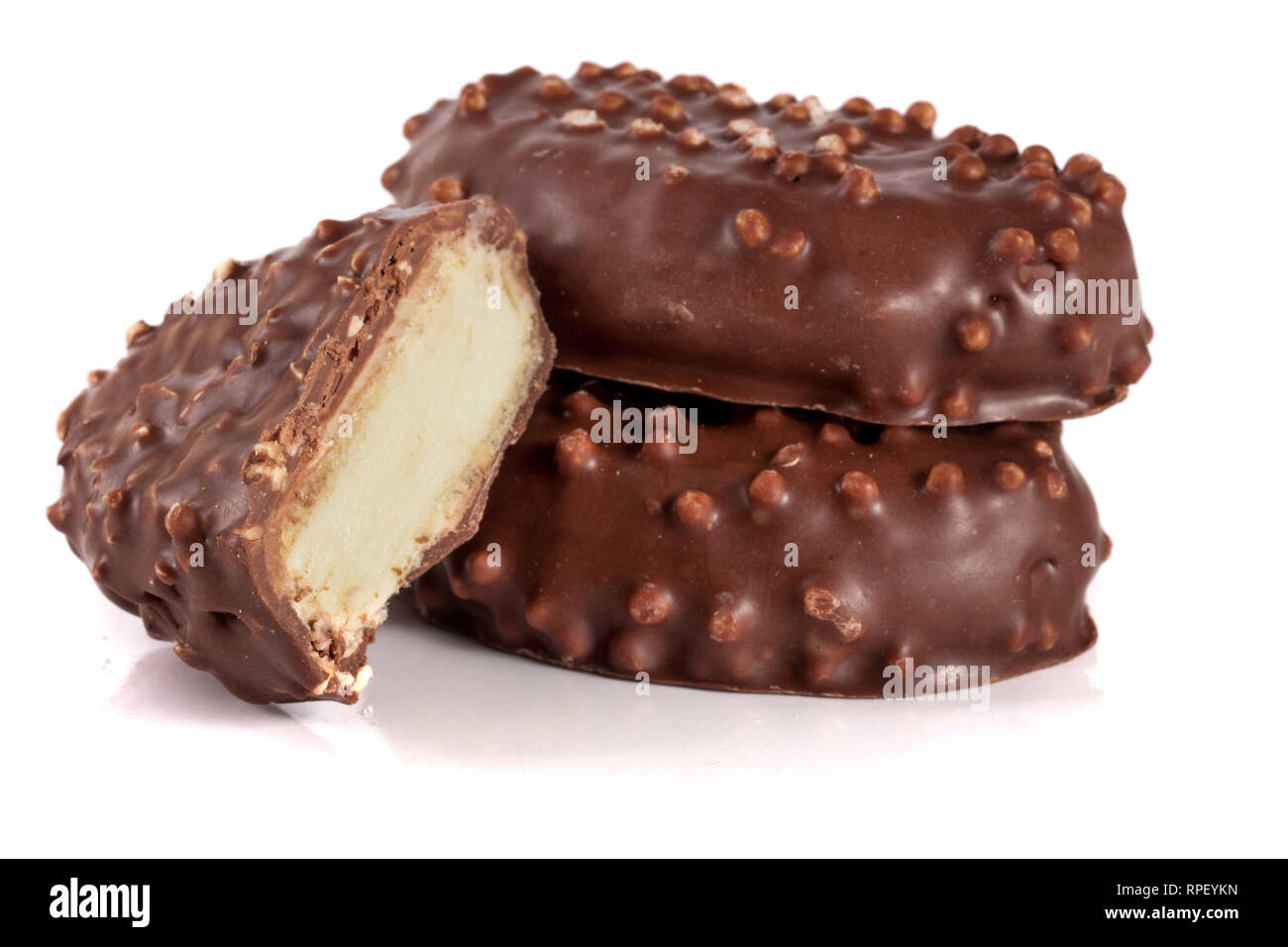 chocolate candy with white cream filling isolated on white background ...