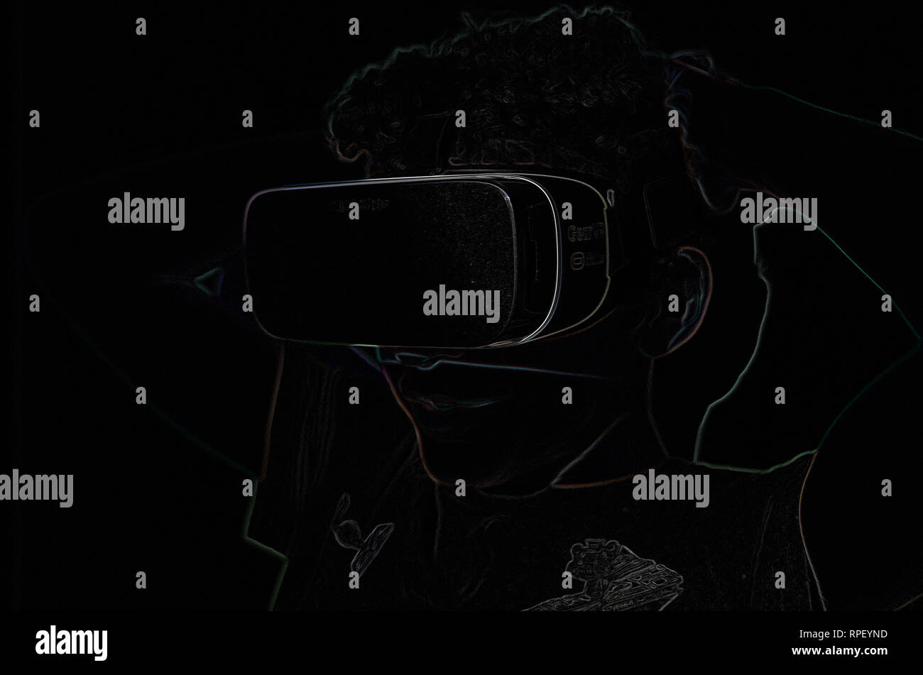 Abstract and conceptual image of a Caucasian boy wearing a VR 360 ...