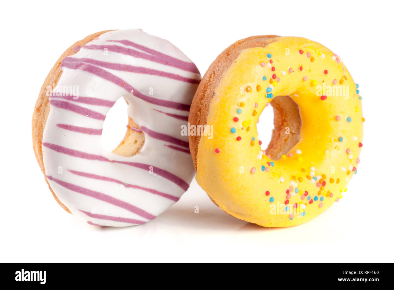 two glazed donut isolated on white background Stock Photo - Alamy