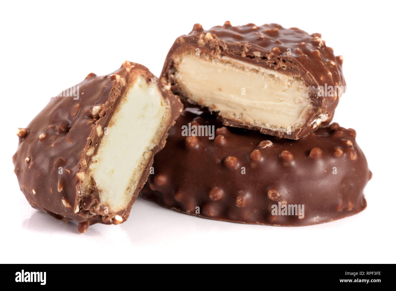 chocolate candy with white cream filling isolated on white background ...
