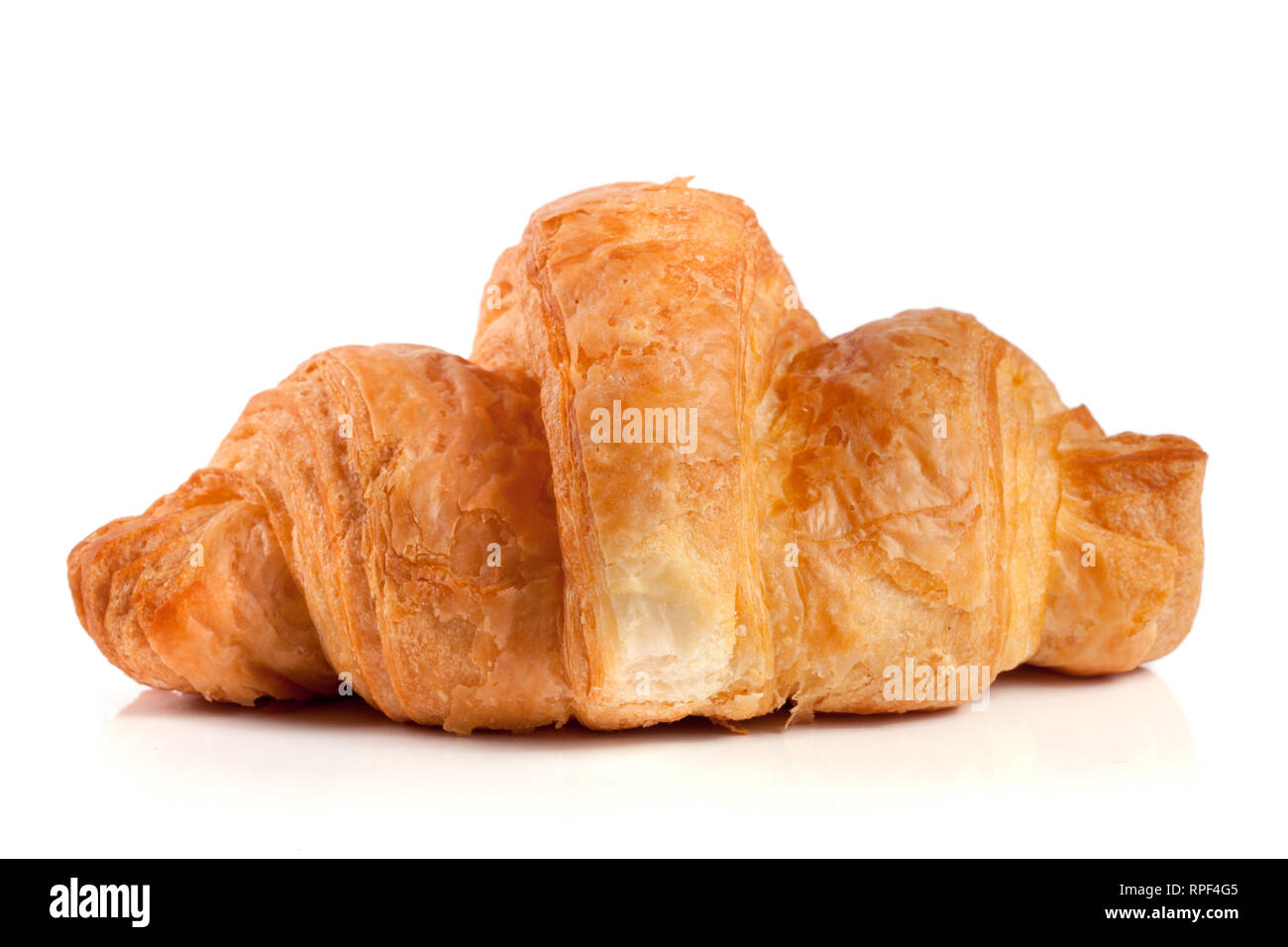 one croissant isolated on white background closeup Stock Photo - Alamy