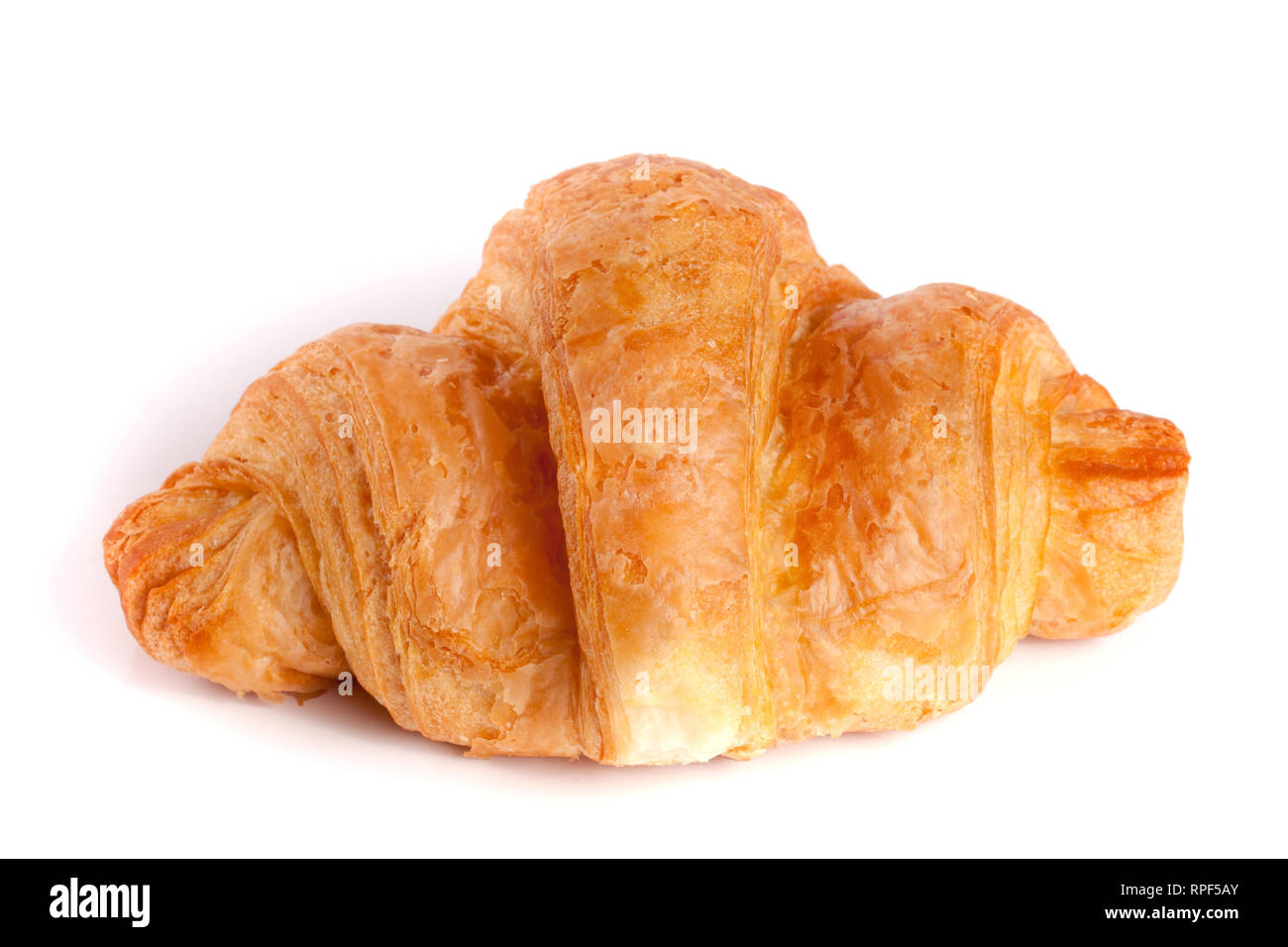 one croissant isolated on white background closeup Stock Photo - Alamy