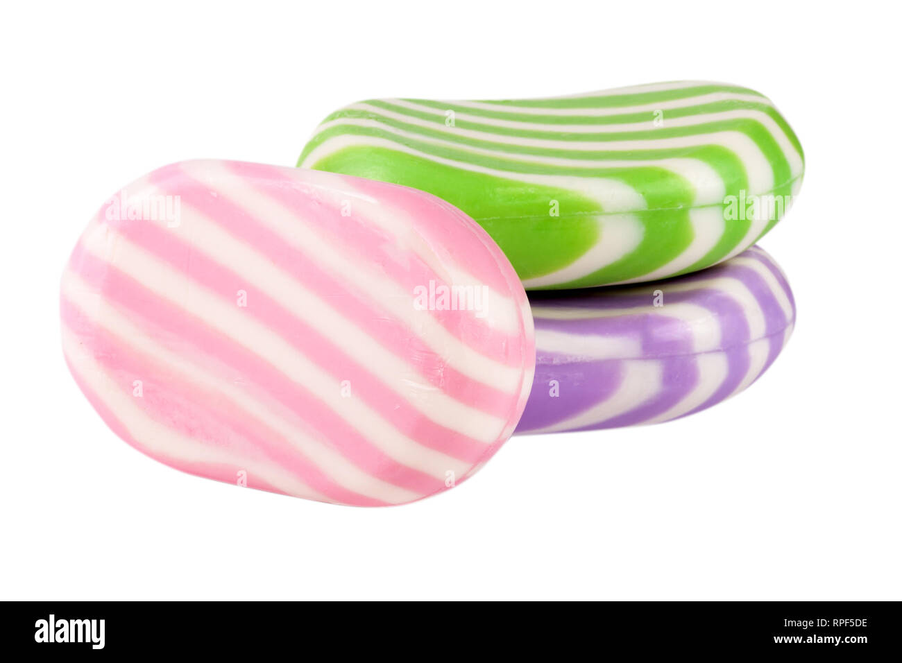 Three multi-colored striped soaps isolated on white background Stock ...