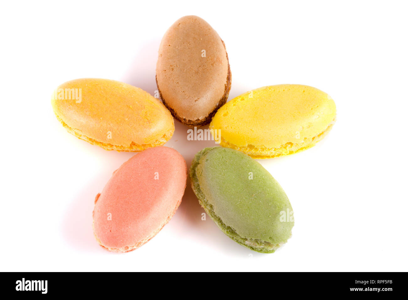 five macaroons isolated on white background closeup Stock Photo - Alamy