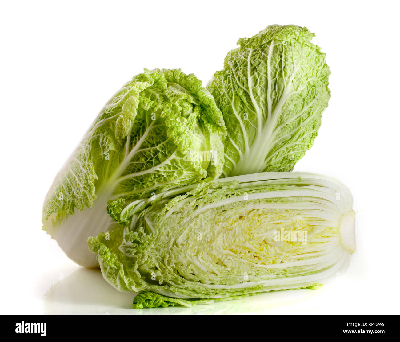 three chinese cabbage and half isolated on white background Stock Photo ...
