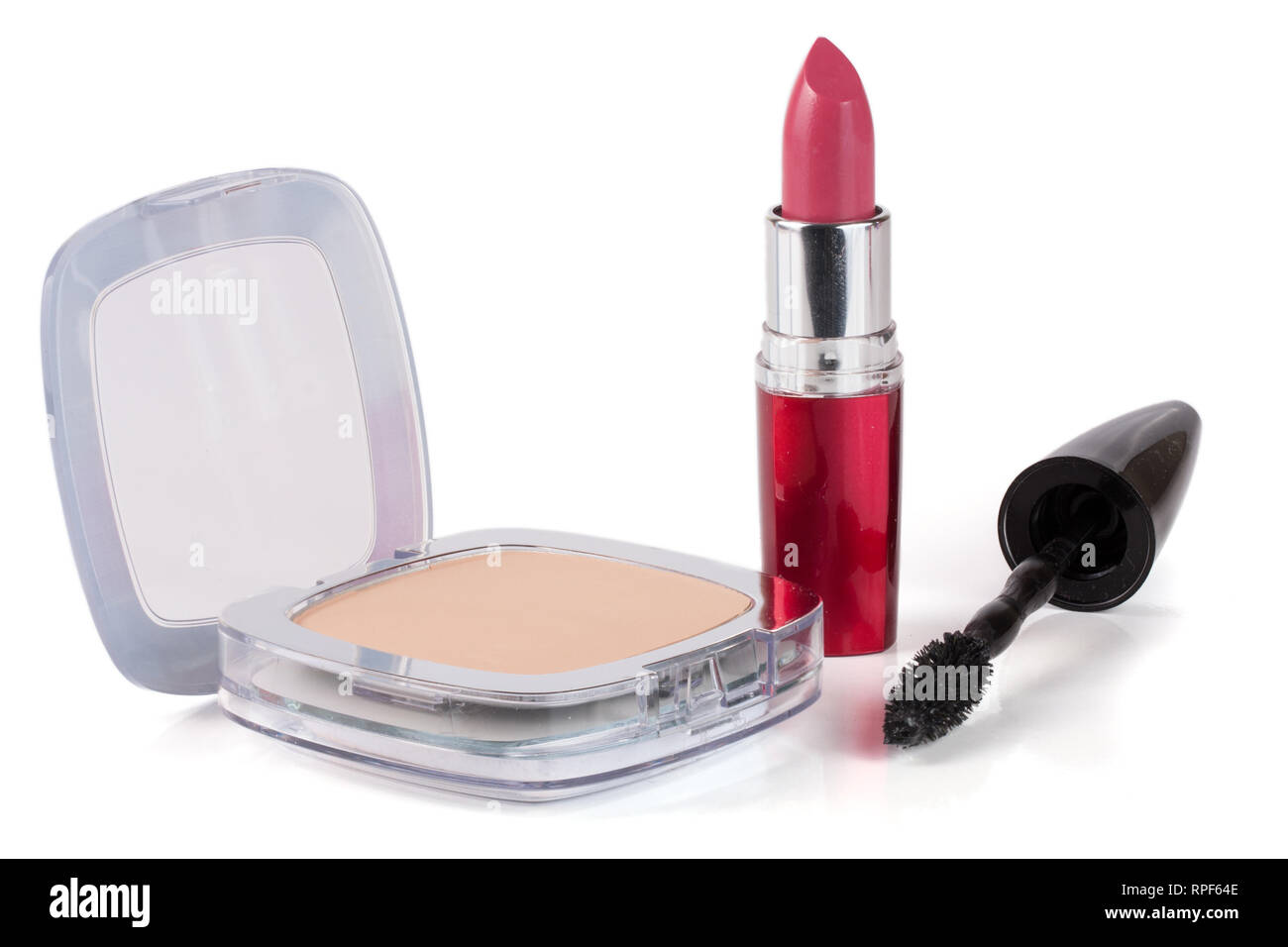 Make-up powder, lipstick and mascara isolated on white background Stock ...
