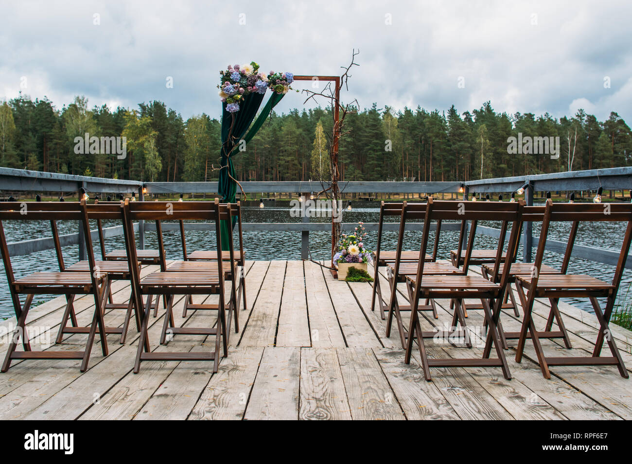 Wedding arch decorations on lake, outdoors Stock Photo - Alamy