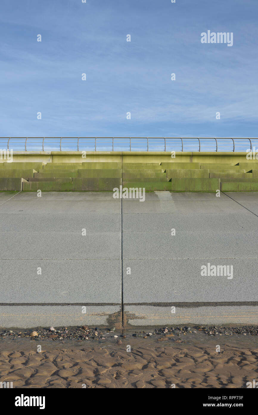 Sloping precast concrete revetment and expansion joints, sea wall with ...