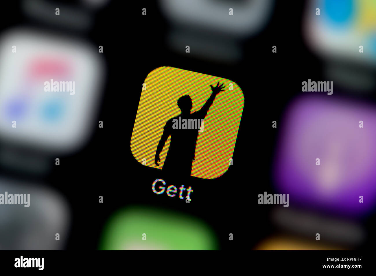 A close-up shot of the Gett app icon, as seen on the screen of a smart ...