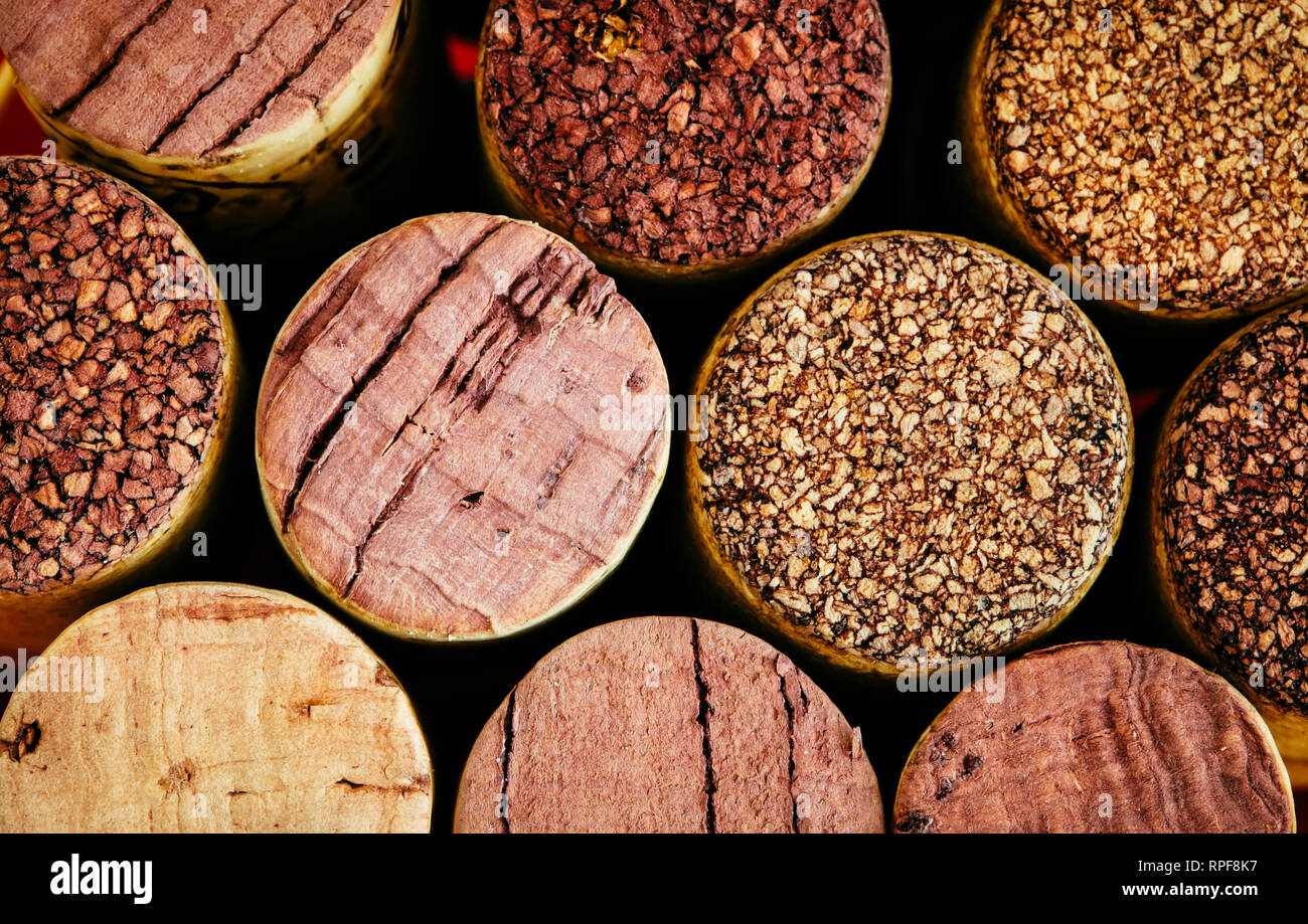 Wine corks side by side in a pile macro close-up background. The used ...