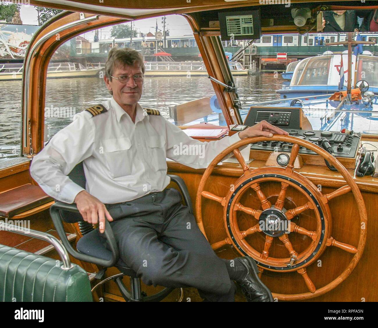 Amsterdam, The Netherlands. 9th Oct, 2005. A captain of a tourist canal ...