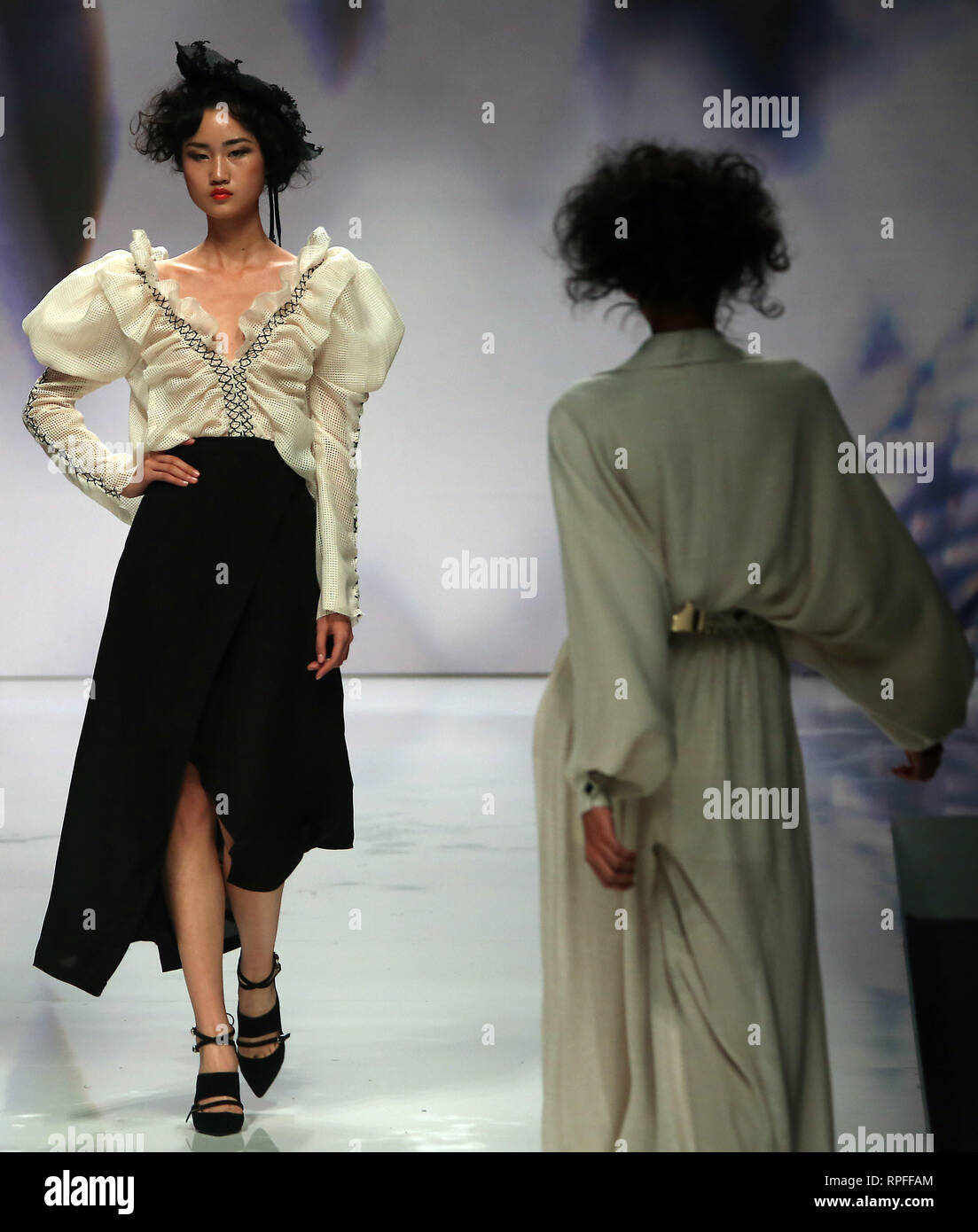 Beijing, China. 29th Mar, 2018. Chinese models wear clothing by ...