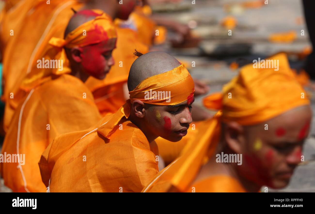 Kathmandu, Nepal. 21st Feb, 2019. Hindu boys attend a religious ritual ...