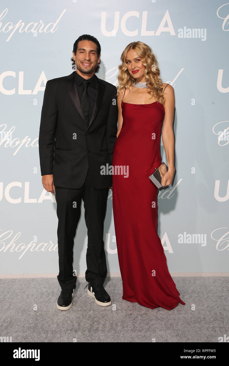 LOS ANGELES, CA- FEBRUARY 21: Benjamin Larretche, Petra Nemcova, at the ...